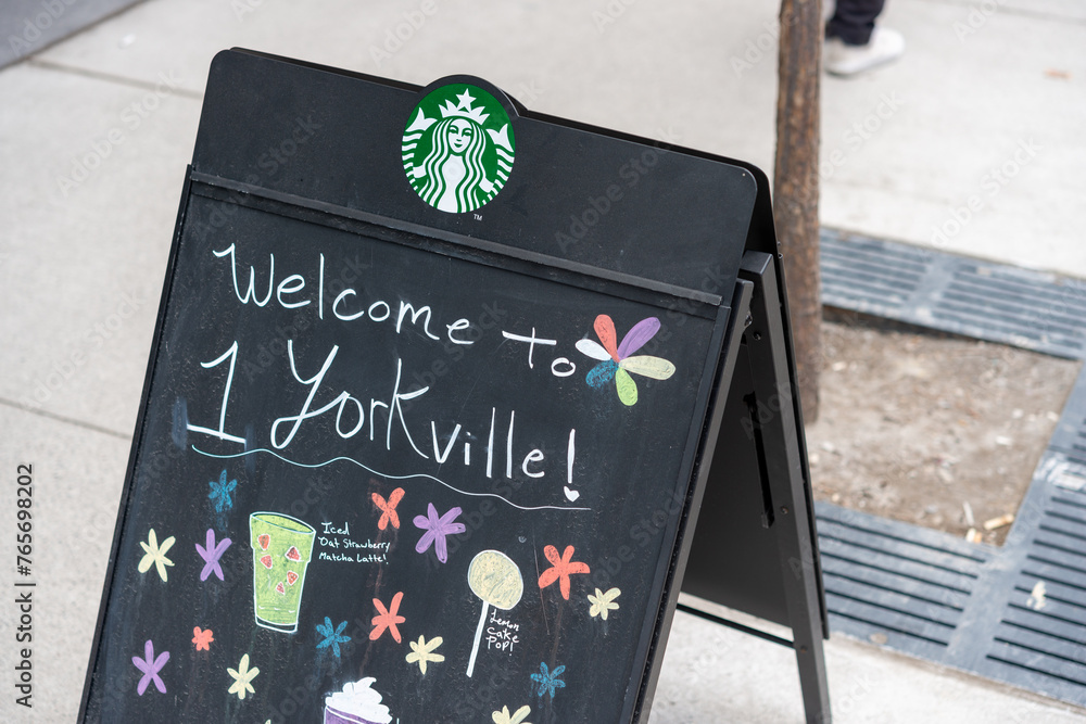 outdoors a-frame sign board with Starbucks coffee shop branding at 1 ...
