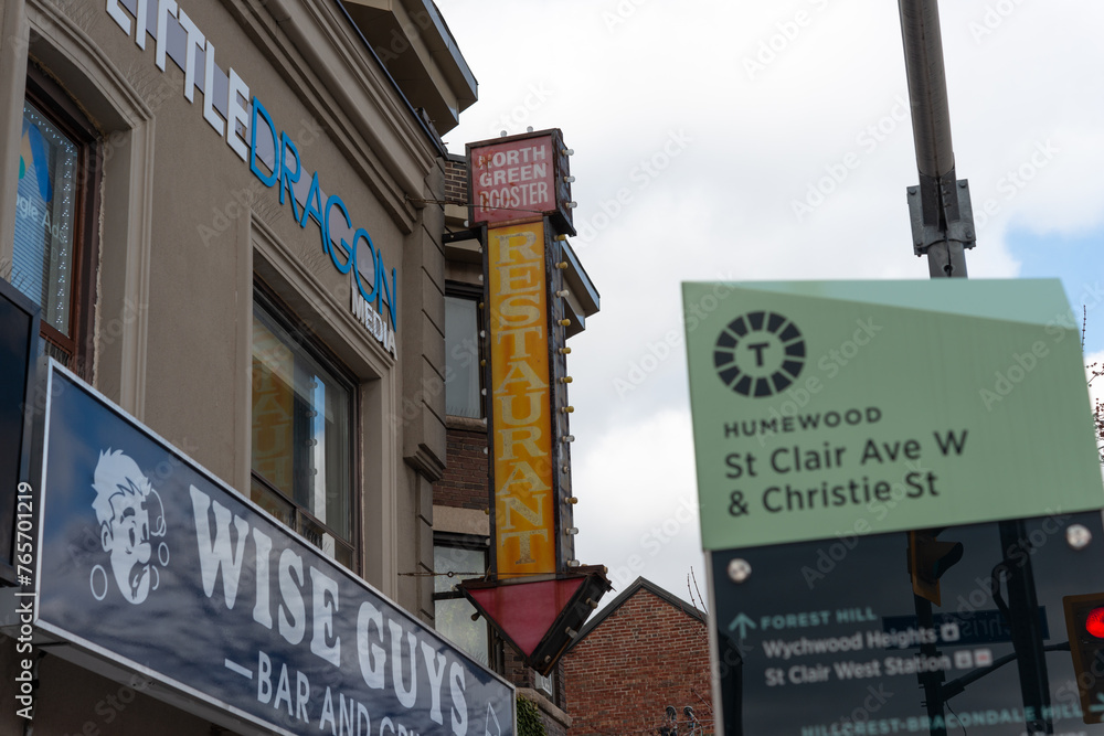 exterior building and sign of Wise Guys Bar & Grill (including city of ...