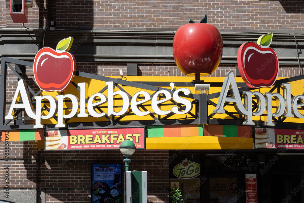 New York, NY, USA - July 4, 2022: Applebee's sign is seen at its grill ...
