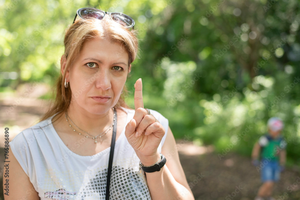 A woman and her son were playing in park and woman injured her finger ...