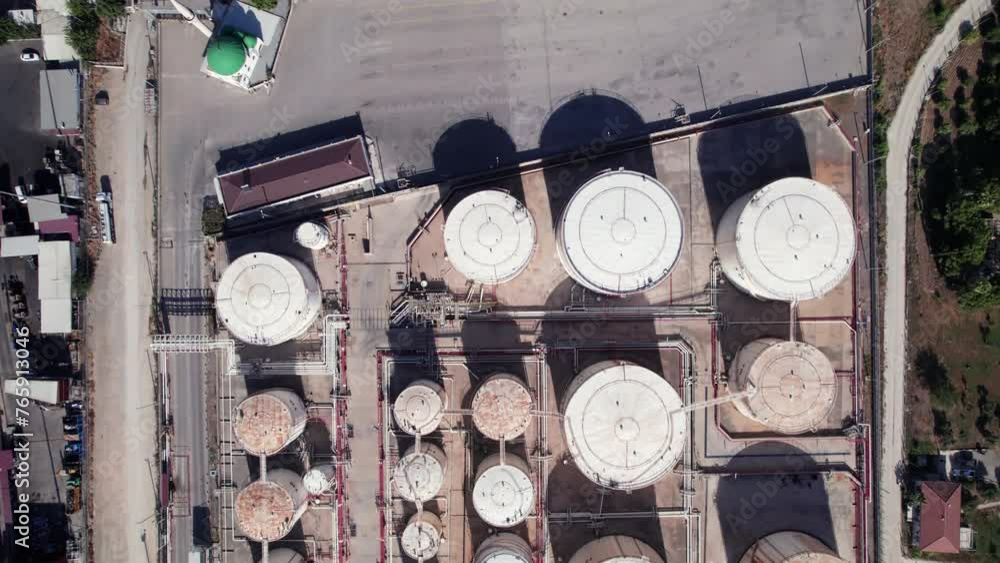 Top down aerial view of fuel tanks. Oil storage tanks aerial view. Oil ...