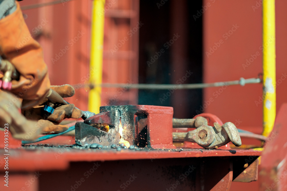 Certified Welder Man Cutting Metal Container Lashing Bar Bracket Using ...