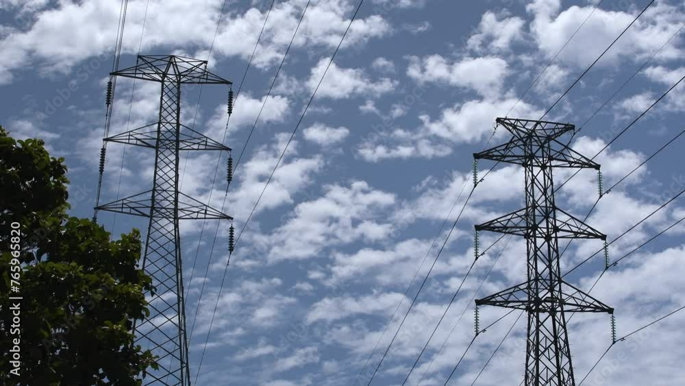 Medium backlit Australian overhead high tension high-voltage ...