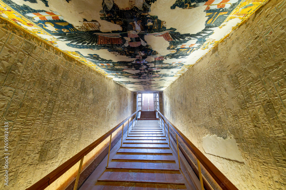 Looking up towards the opening of the narrow steep staircase leading to ...