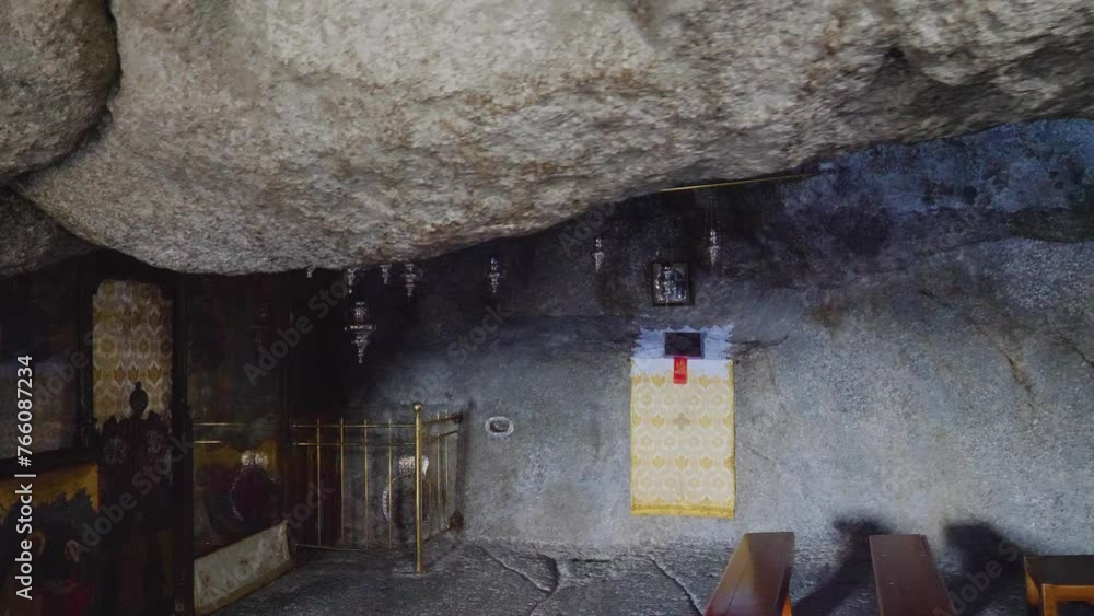 A glimpse into the interior of a church at the Cave of the Apocalypse ...