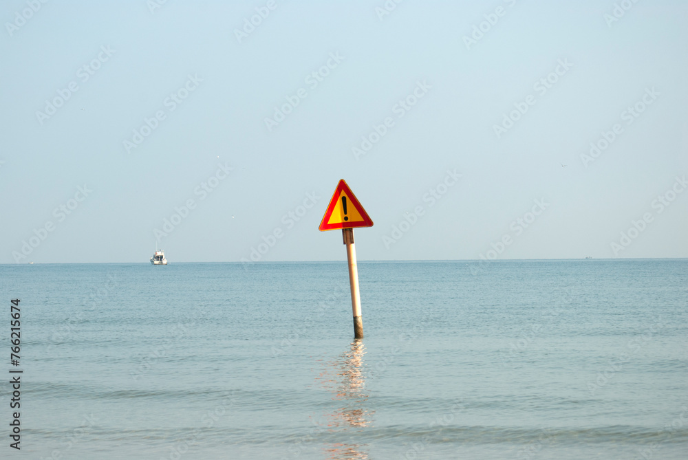 General stock image - Sign with an exclamation mark sticking out of the ...