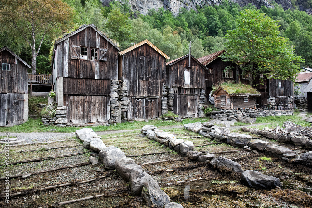 Typical old fishing shacks at the Village of Geiranger and the ...