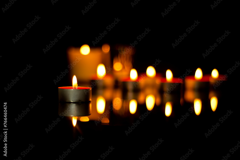 The flickering lights of candles in memory of the deceased In the ...