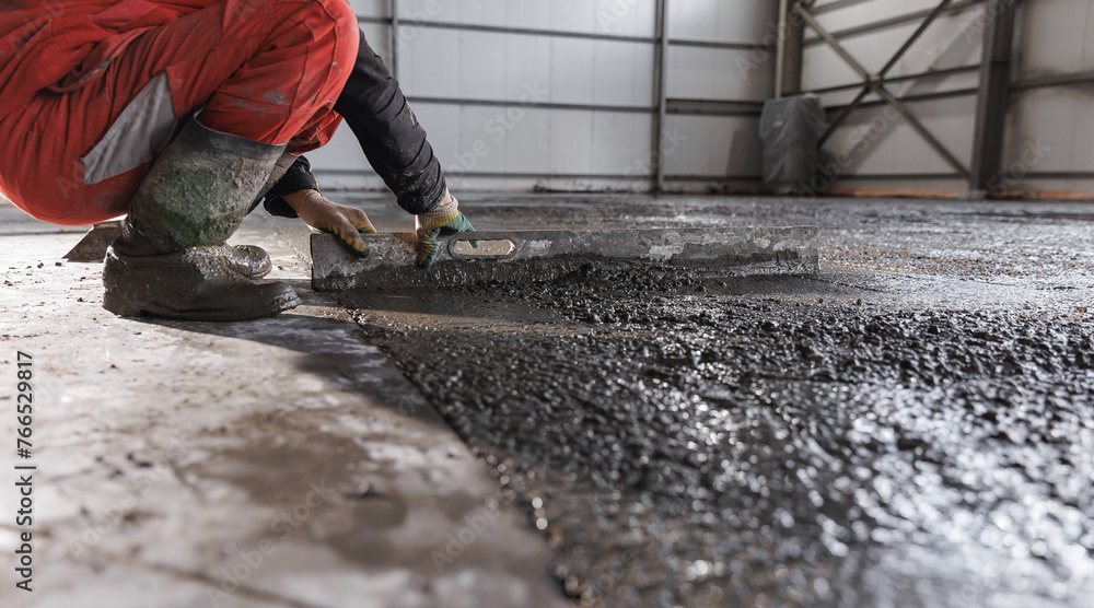 Construction site of buildings pouring cement. Top view new screed ...