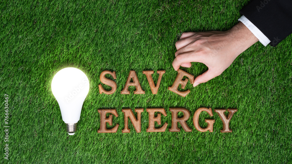 Hand arrange wooden alphabet in ECO awareness campaign on biophilia ...