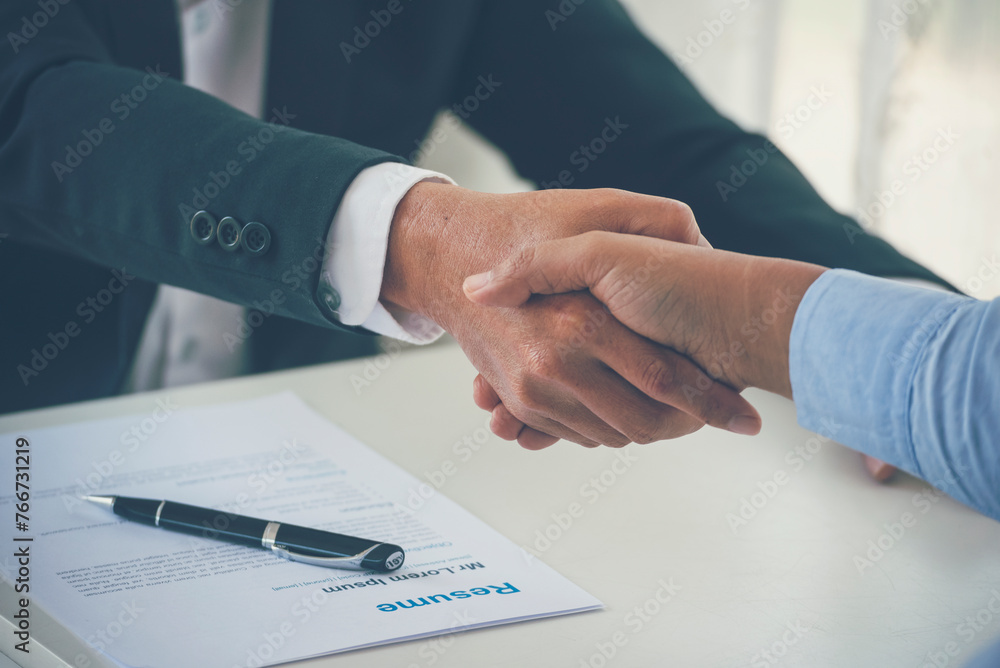 Close up hands Team Business Partners shaking hands together to ...