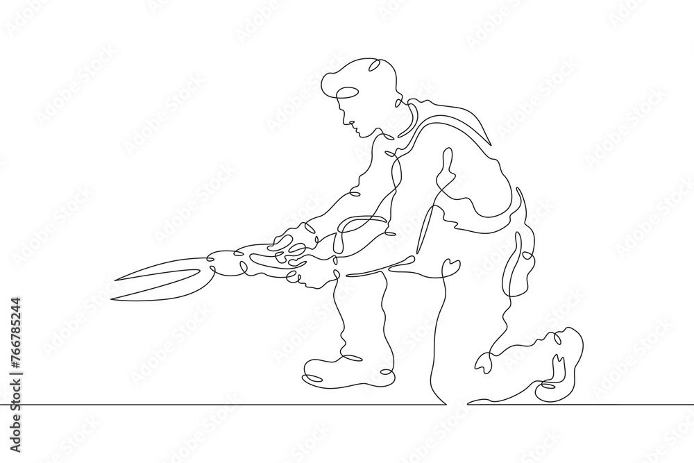 Gardener at work. Worker with garden tools. Farmer in the garden ...