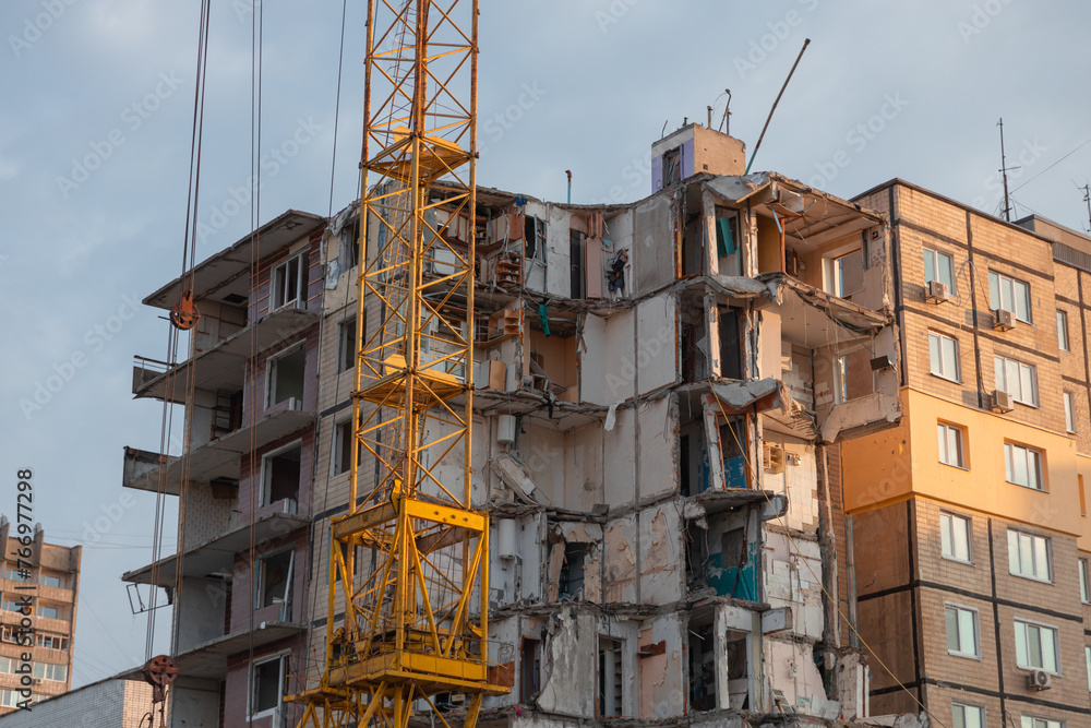 They began to dismantle parts of the building destroyed by the rocket ...