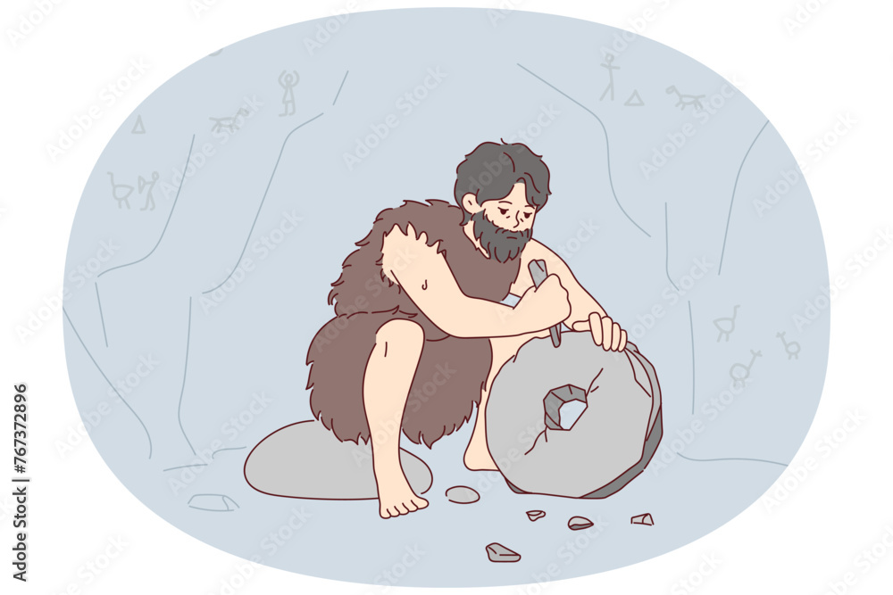 Ancient man with beard who lives in cave uses stone tool to create ...
