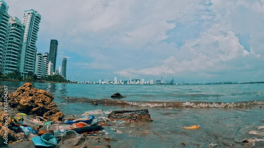 Plastic pollution in the water on the beach of Cartagena de Indias ...