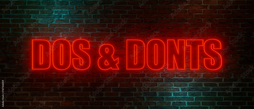 Dos and donts. Brick wall at night with the text "dos and donts" in red ...
