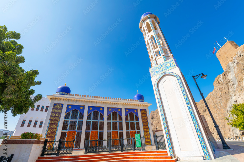 Exterior view of the facade and minaret of Masjid Al Khor Mosque with ...