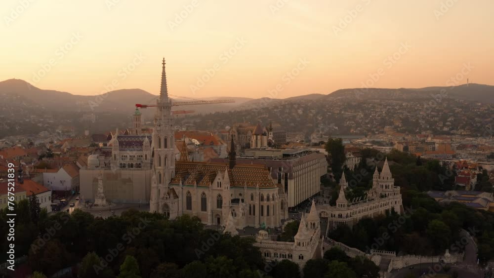 Panoramic view of Buda Castle Hill during sunset. Burning orange sunset ...