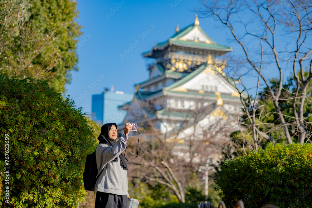 Travel, Muslim travel, Asian Muslim female tourist walking and visitor ...