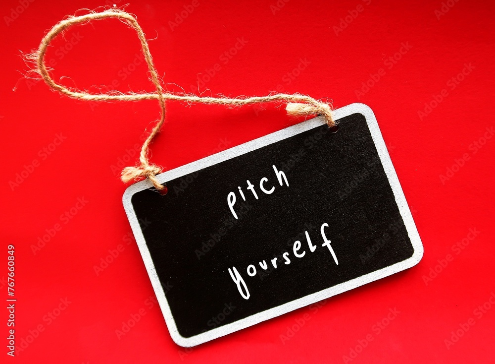 Chalkboard with handwritten text PITCH YOURSELF, means Evelator pitch ...