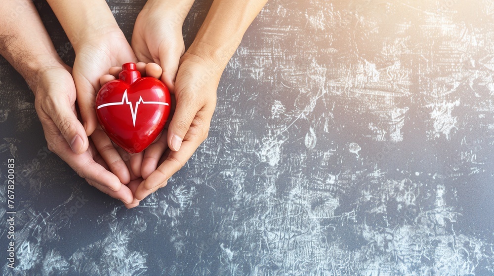 heart in hands, Adult and child holding a red heart with ECG line ...