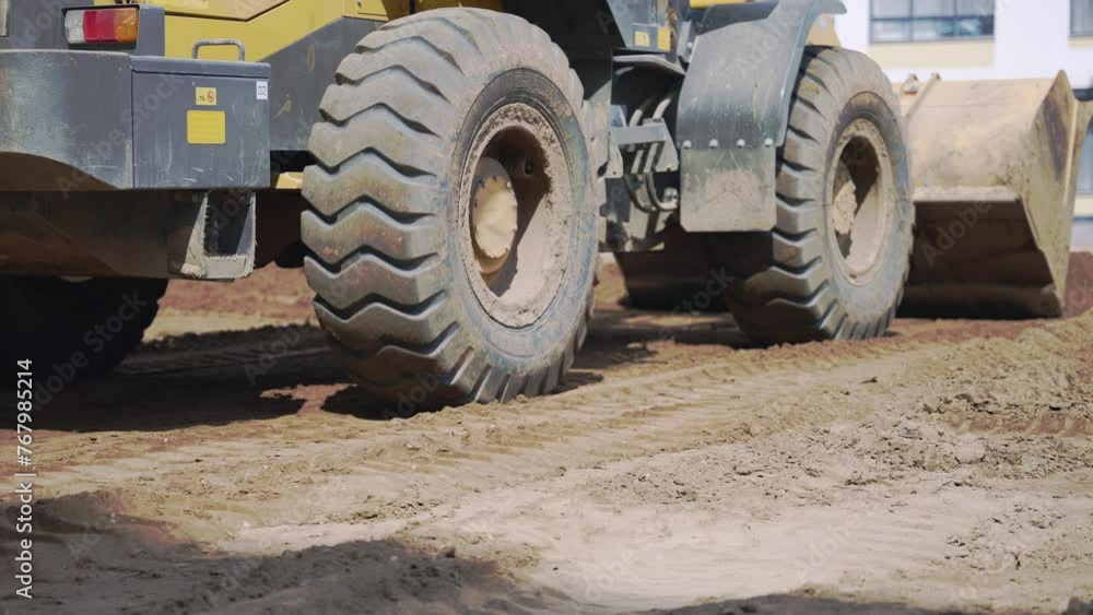 A motor vehicle equipped with locking hubs is using its tires with ...