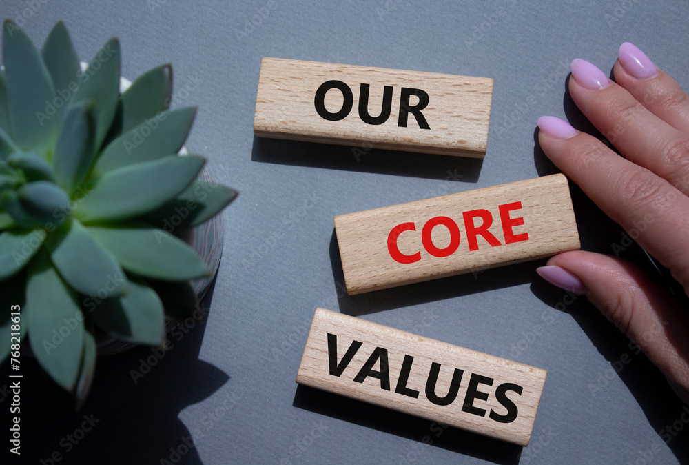 Our core values symbol. Concept words Our core values on wooden blocks ...