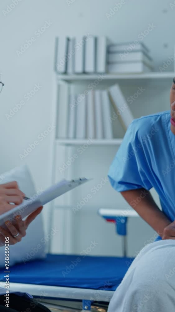 Vertical footage of Doctor examining patient stomach ache by touching ...