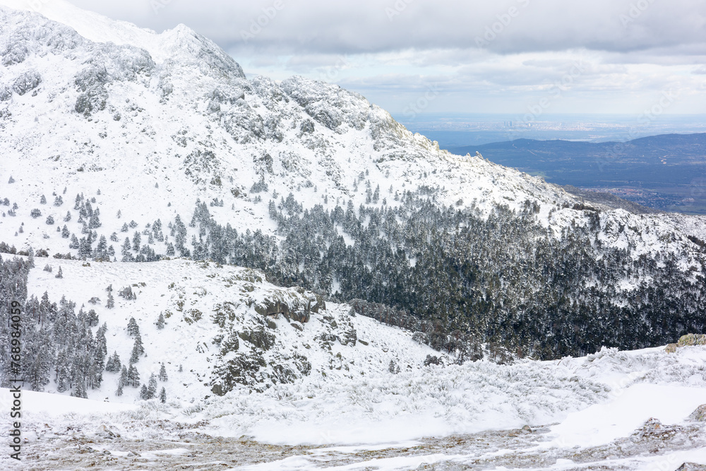 snowy landscapes of Puerto de Navacerrada in the Sierra de Guadarrama ...