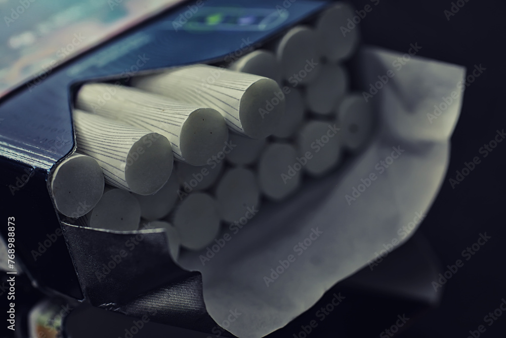 Harmful deadly habit of smoking. Tobacco smoking. Cigarettes in a pack ...