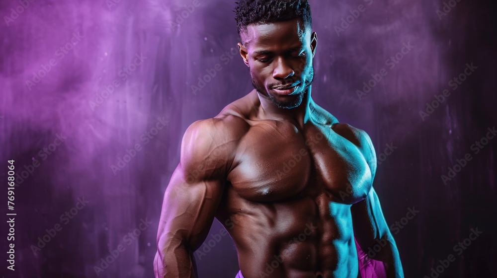 Afro athlete bodybuilder fitness model with abdominal muscles pose in ...