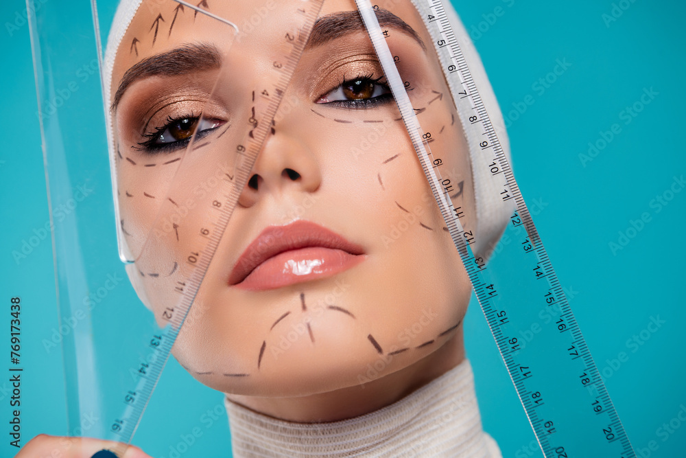 Close up photo of lady using ruler for measure face before plastic ...