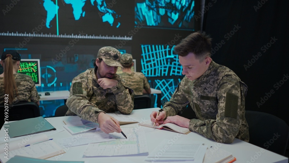 Group of security squad in control center. Military headquarters ...