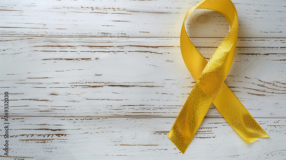 Flat lay gold satin cancer ribbon timber wash background childhood copd ...