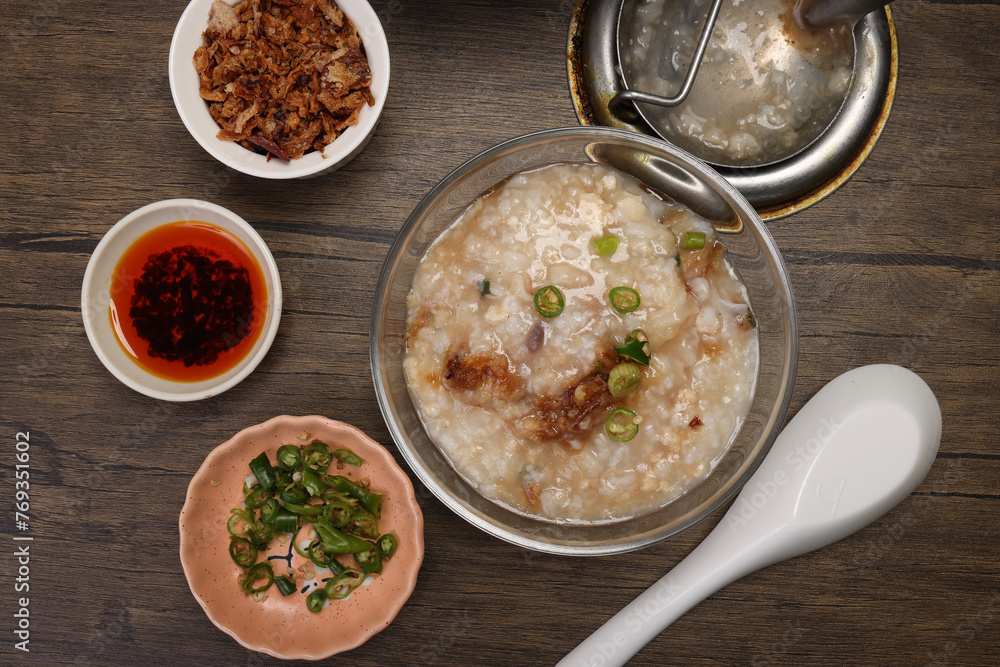 Asian thick rice porridge bubur chicken beef meat fish prawn rustic ...