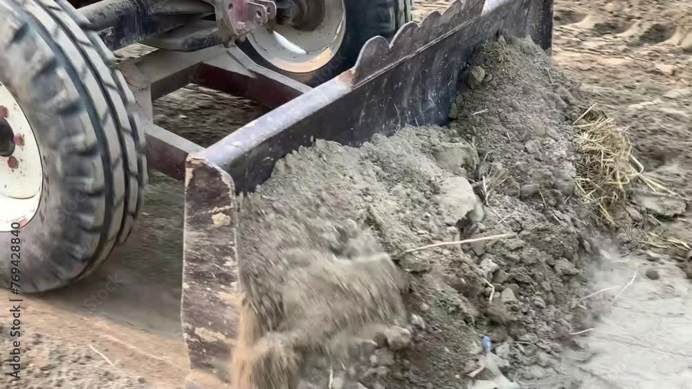 Vidéo Stock Labor Day concept: close-up operation of the tractor ...