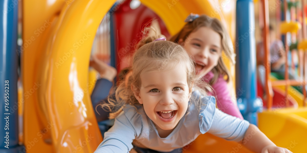 Happy cheerful kids having a blast at indoor play center. Children ...