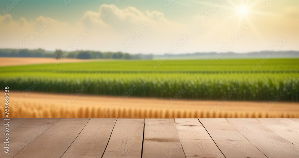 Empty wooden table, counter desk with blurred agricultural field ...
