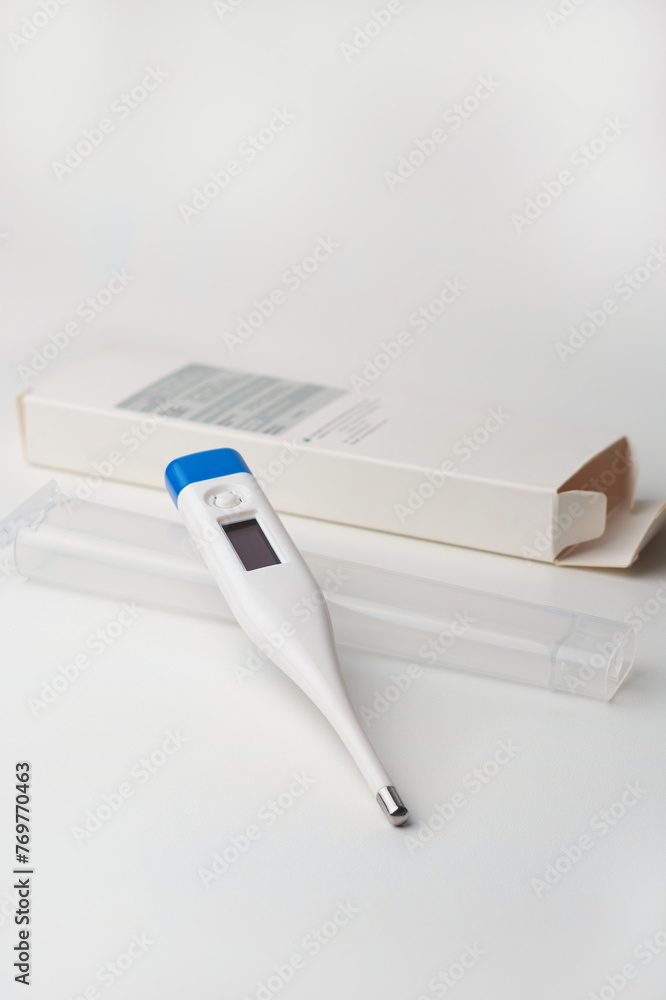 modern digital thermometer with box plastic cover, electronic device ...