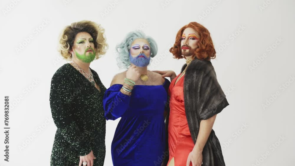 Elegant Drag Queens Posing in Glamorous Attire for a Studio Photoshoot ...