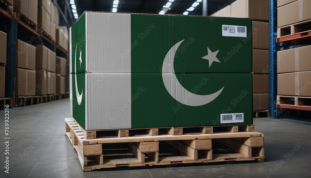 Cardboard boxes and a pallet with the Pakistan flag, symbolizing export ...