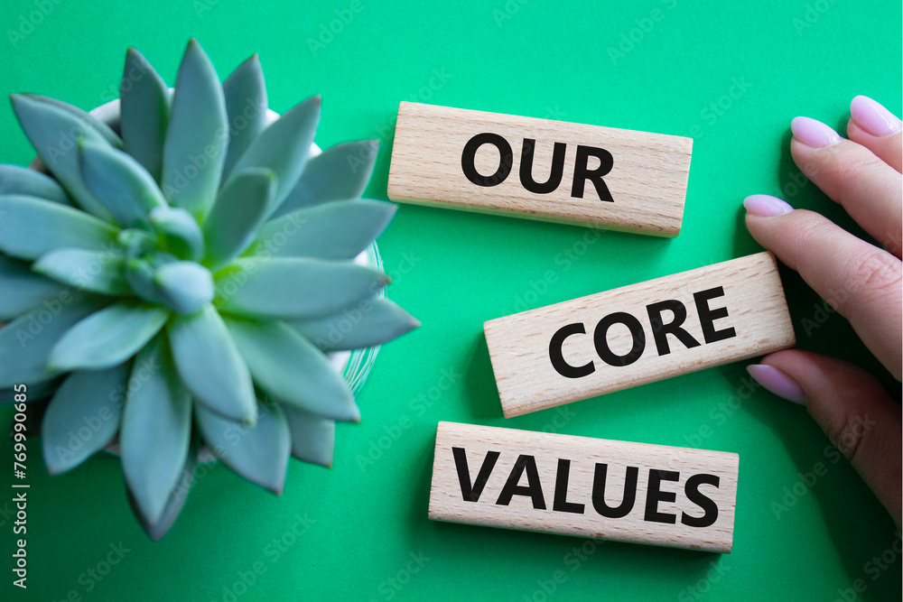 Our core values symbol. Concept words Our core values on wooden blocks ...