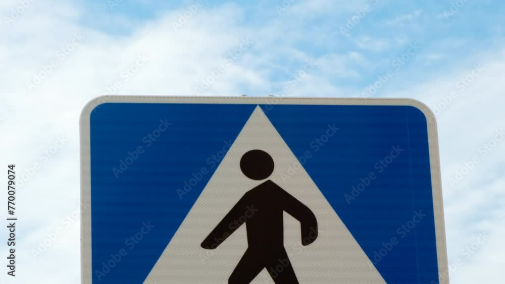 Pedestrian Crossing sign with a blue background, featuring a pictogram ...