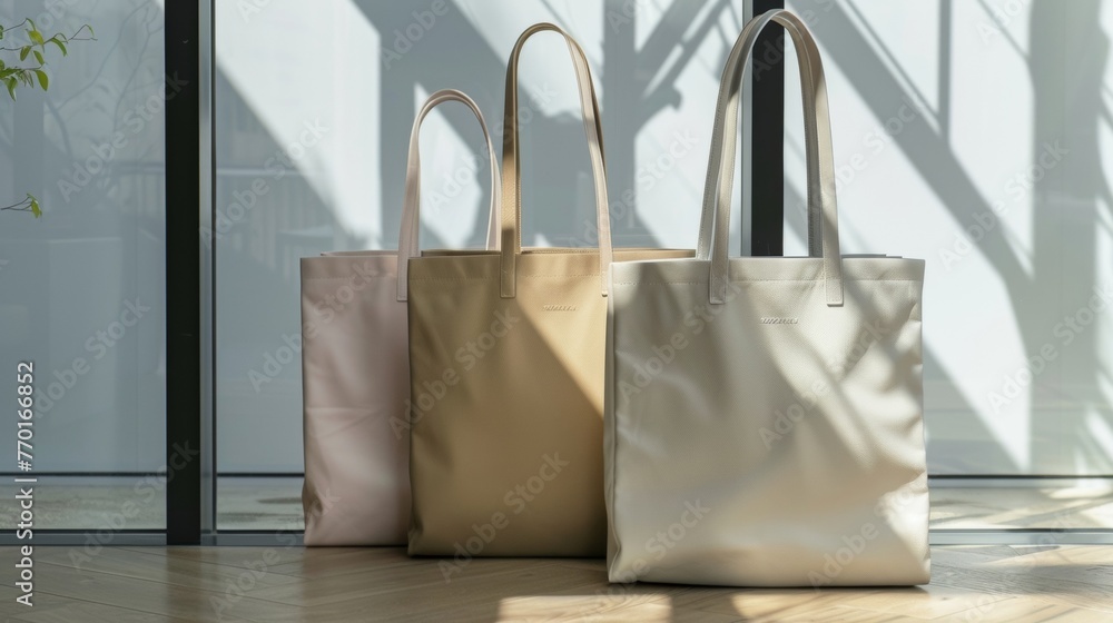 This versatile tote bag in neutral tones features a large logo in the ...
