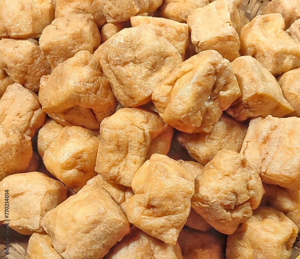 Tahu goreng or Fried Tofu, photographed close up. Indonesian ...