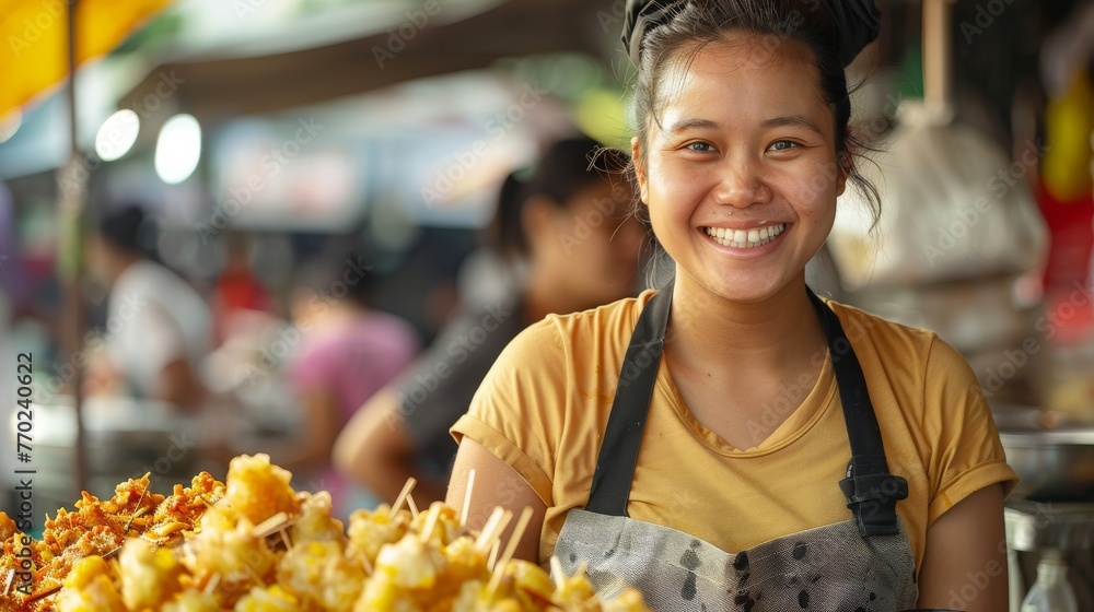 Happy Asian street foods vendor selling freshly made snacks at the ...