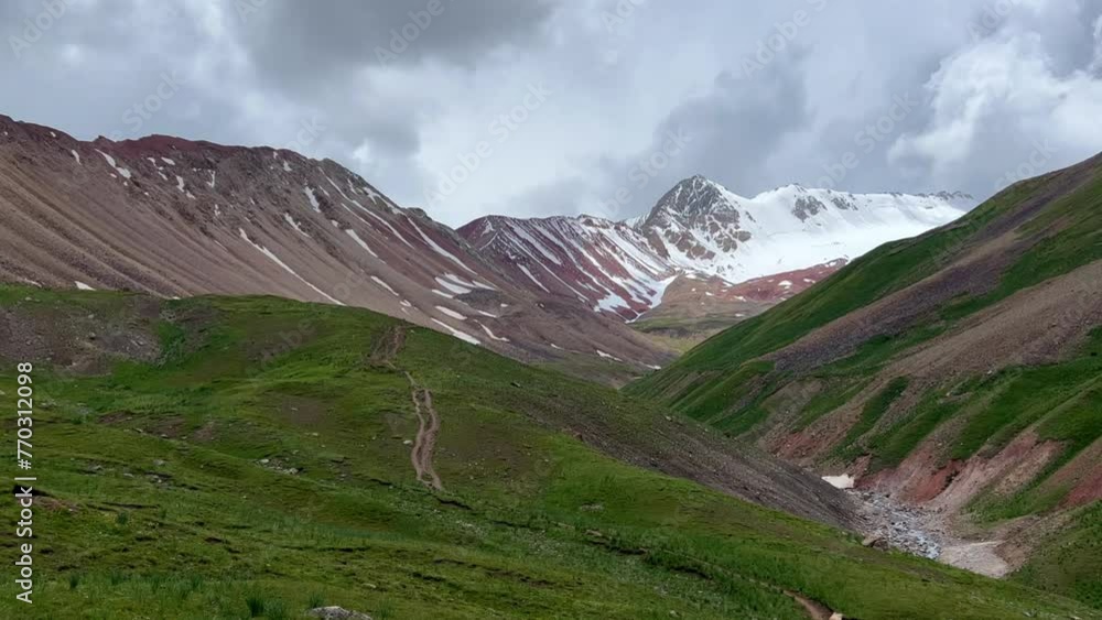 View of Lenin Peak, one of the highest peaks of Central Asia. The Pamir ...