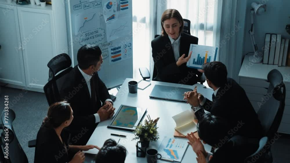 Top view of executive manager looking at financial graph while skilled ...