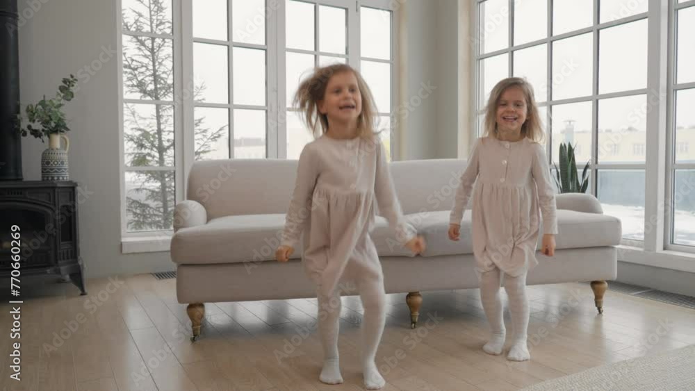 Two children twins playing at home. Happy cheerful mischievous little ...