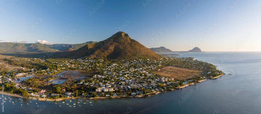 Aerial view of Tamarin village and marina with blue ocean and Le ...